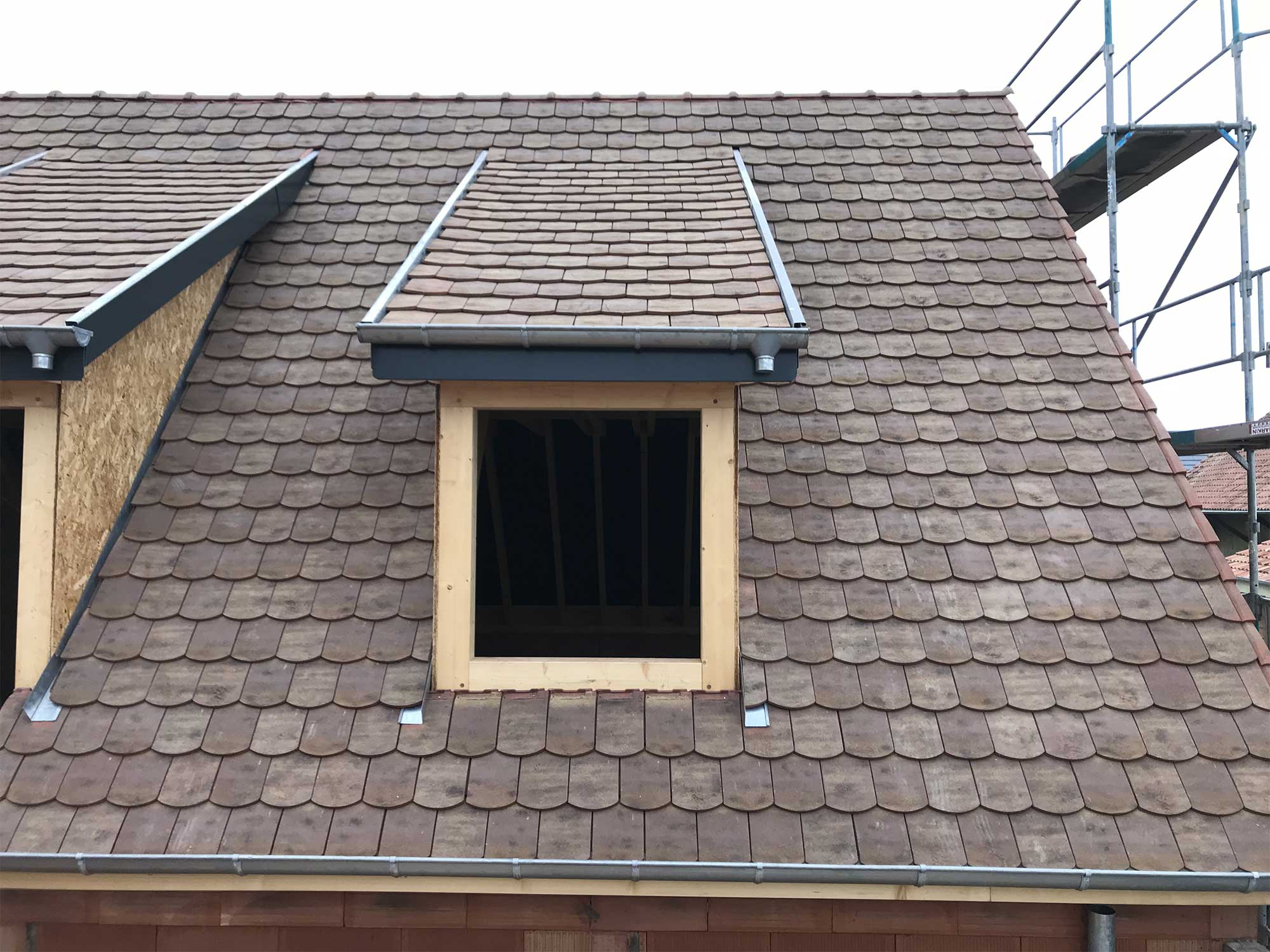 Charpente, extensions & création de lucarne - Cheminette